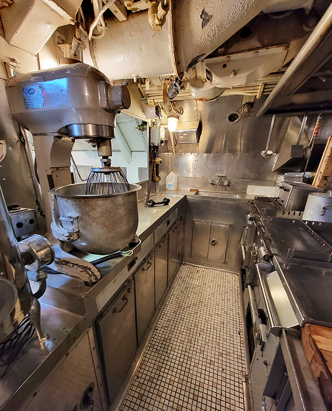Imagine whipping up meals for dozens of hungry sailors in this tiny galley. Your kitchen complaints will suddenly seem trivial!
