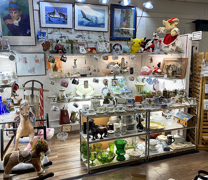 Glassware heaven! Depression glass mingles with mid-century treasures in a display that would make your grandmother both proud and jealous.