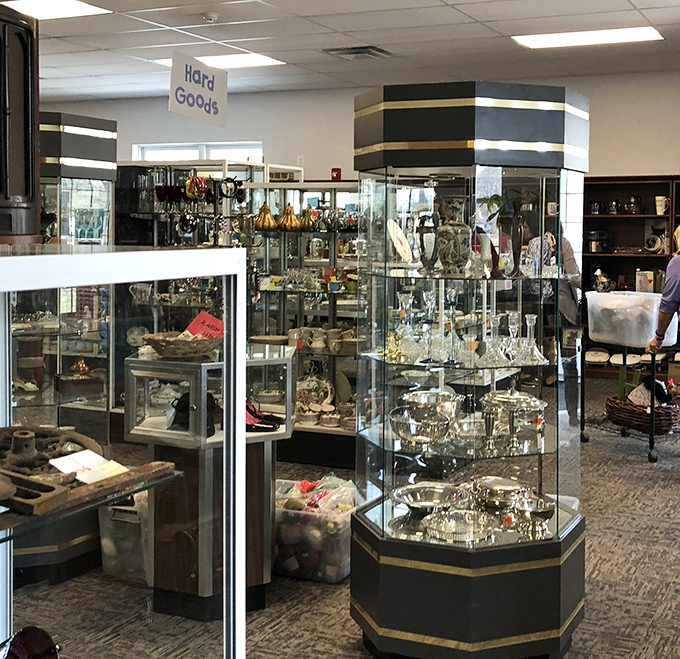 Glass cases protect delicate treasures while tempting shoppers with the glint of silver and crystal just waiting for a second chance.