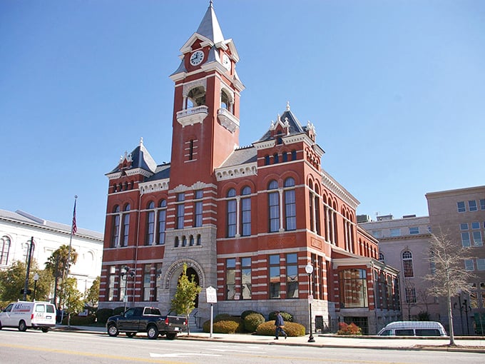 The Clinton County Courthouse stands proud in its brick-red glory, like that one relative who dresses impeccably for every family gathering, no matter the occasion.