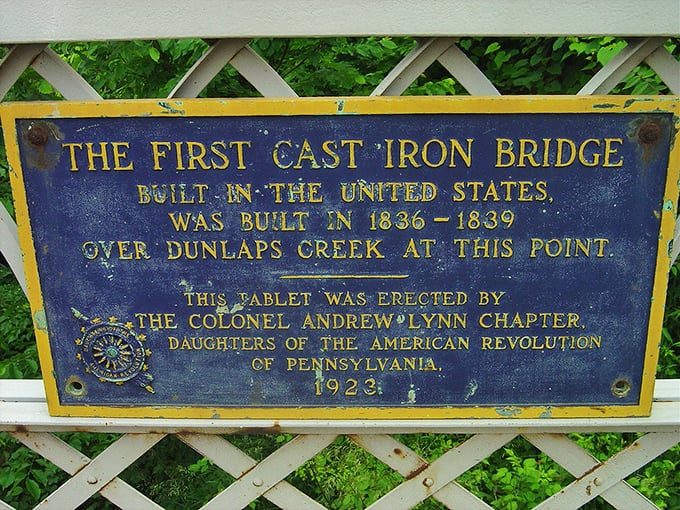 America's first cast iron bridge – engineering marvel from 1839 that still spans Dunlap's Creek, proving they truly built things to last.