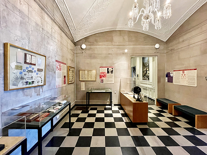 Black and white checkered floors and crystal chandeliers&mdash;because nothing says "let's examine medical history" quite like unexpected elegance.