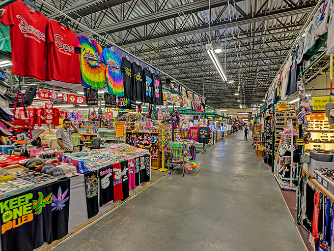 Endless aisles of possibility stretch before you, where tie-dye t-shirts hang like psychedelic flags marking retail territories.