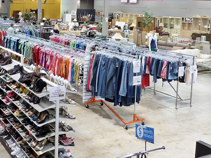 Rainbow-ordered clothing racks stretch toward furniture horizons. This meticulous organization system makes hunting for that perfect linen shirt feel less like work and more like destiny.