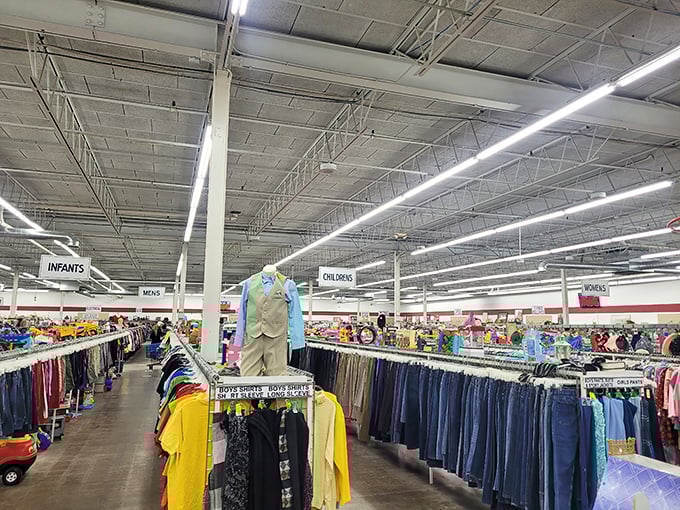 Racks upon racks stretch toward the horizon like a fabric forest. The organization would make Marie Kondo weep with joy.