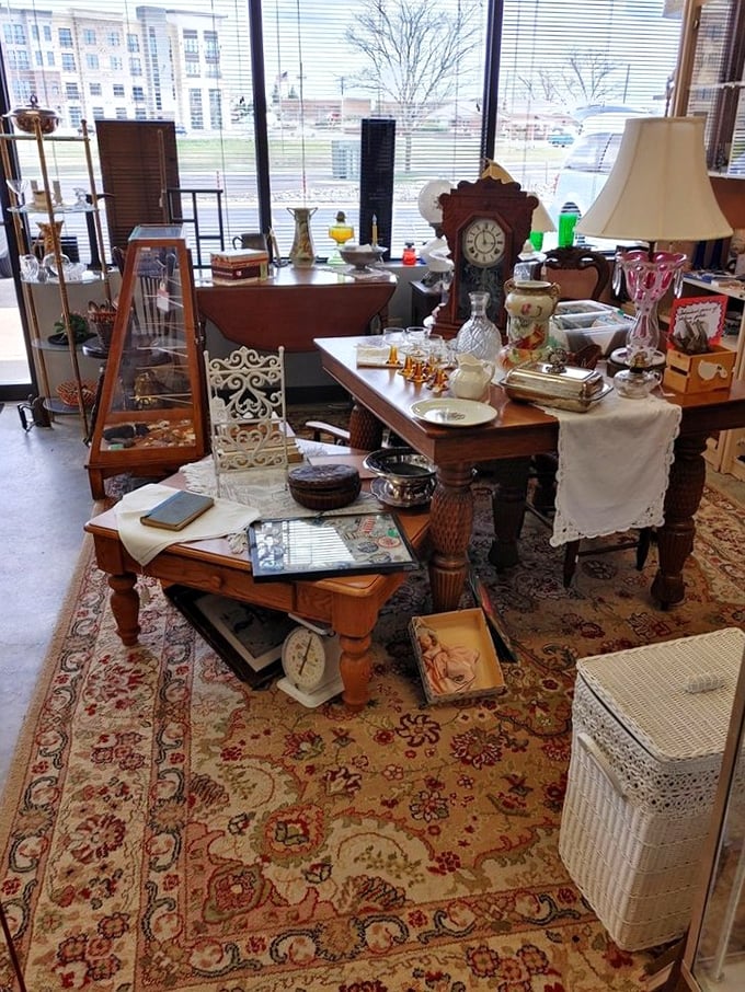 Every surface tells a story in this carefully curated corner. That wooden table has probably hosted more family dinners than your favorite sitcom family.