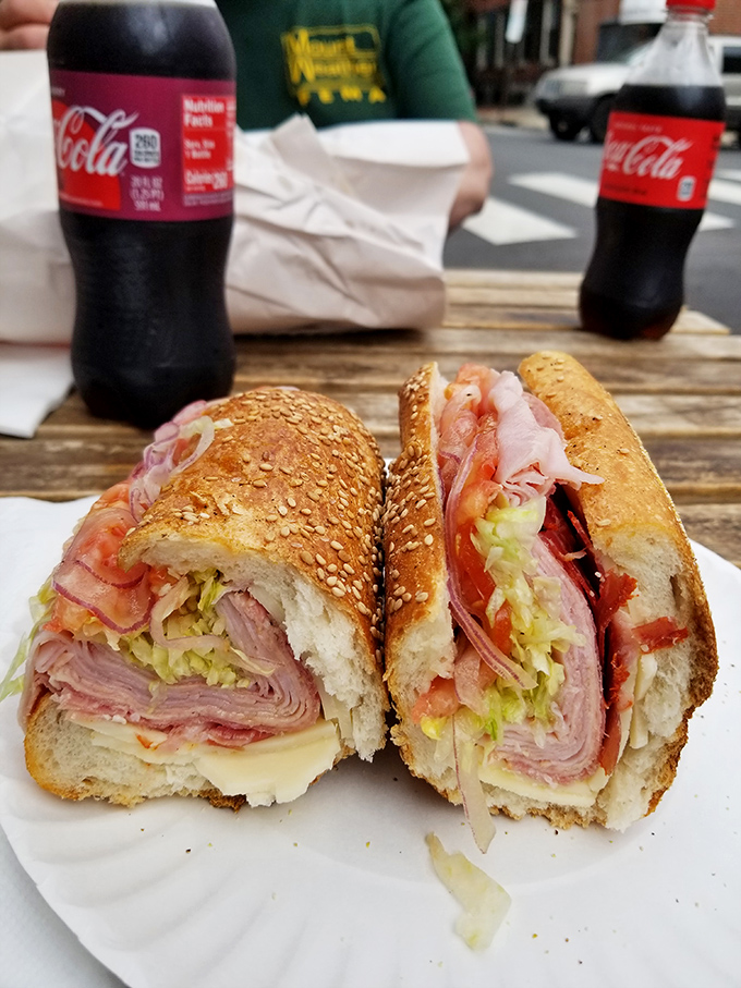 Behold the Italian hoagie in all its layered glory! This architectural marvel of meat, cheese, and veggies deserves its own Philadelphia mural.