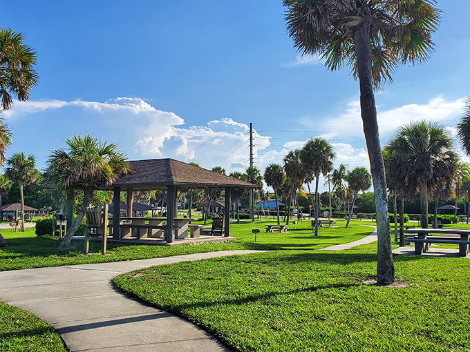 Palm trees stand sentinel over Jaycee Park's pristine grounds. The perfect spot to picnic while debating life's important questions&mdash;like which beach to visit next.