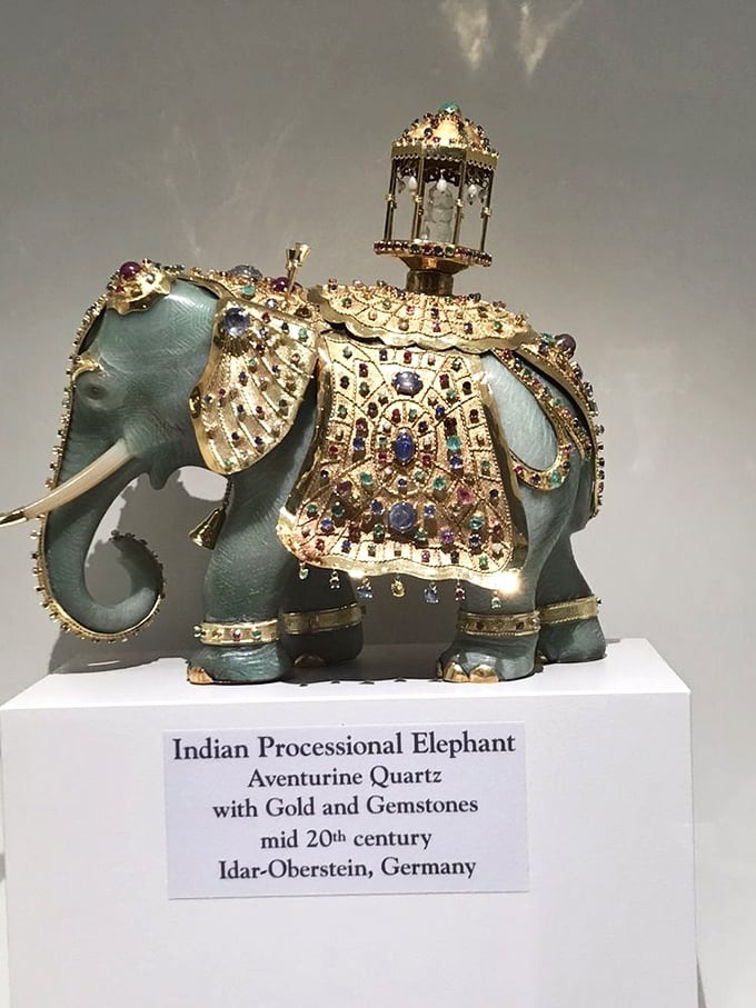 This bejeweled elephant isn't just showing off&mdash;it's a masterclass in lapidary artistry, with aventurine quartz forming the perfect canvas for gold and gemstone adornments.