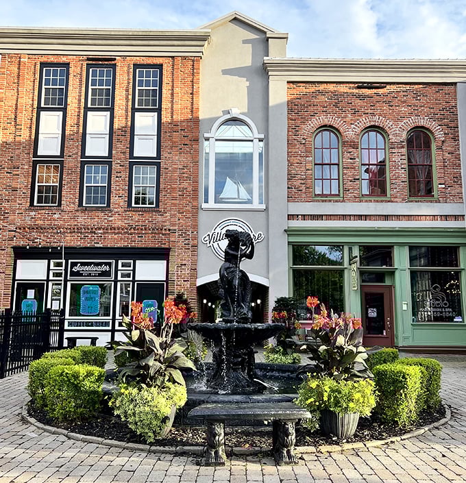 A delightful courtyard fountain creates a peaceful oasis among the historic brick buildings, inviting visitors to pause and enjoy the moment.