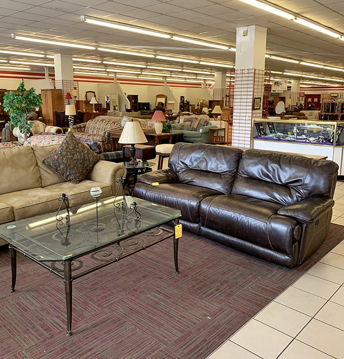 Living room vignettes invite you to imagine these gently-loved leather sofas and glass coffee tables in your own home&mdash;at a fraction of retail prices.