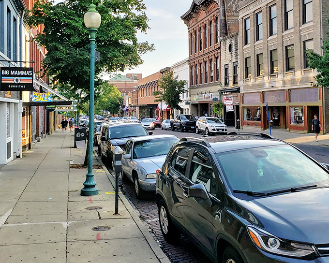 Looking north on Court Street reveals Athens' perfect blend of college-town energy and small-town charm, where every storefront has a story.