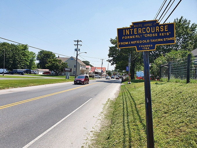 The iconic blue sign welcomes you to Intercourse, Pennsylvania &ndash; formerly "Cross Keys," named in 1814, and yes, everyone makes the same joke.