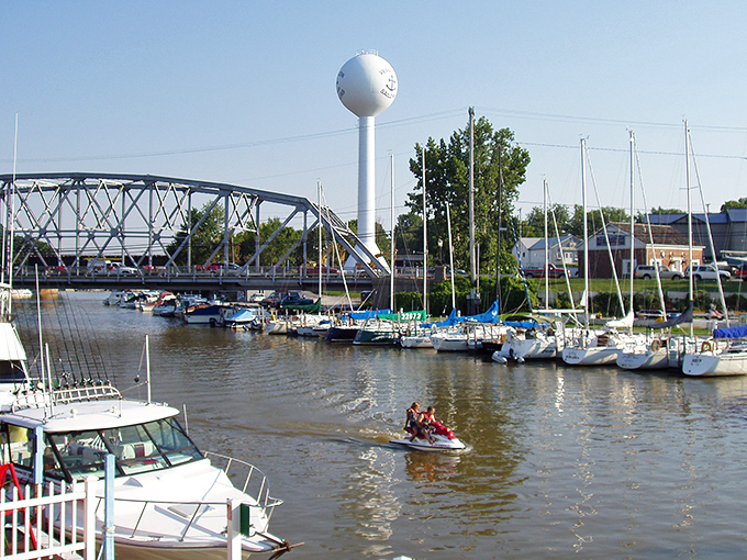 The marina where sailboats and power boats coexist peacefully, like Democrats and Republicans at a really good barbecue. Lake Erie's nautical heart on display. 