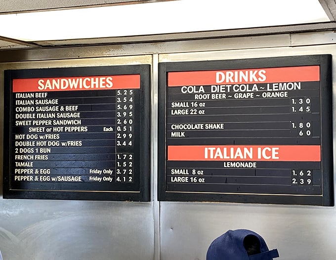 The menu board speaks the ancient language of Chicago street food: simple offerings, minimal descriptions, maximum flavor potential.