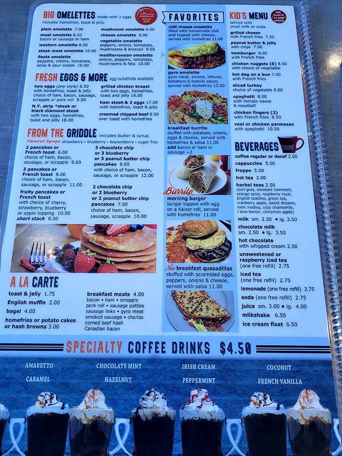 This menu reads like a love letter to comfort food, featuring everything from fluffy pancakes to hearty omelets.