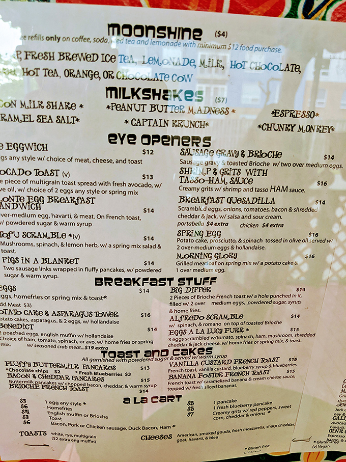 The menu reads like a love letter to comfort food. "Captain Krunch" milkshakes and "Pigs in a Blanket" prove breakfast has no bedtime here.