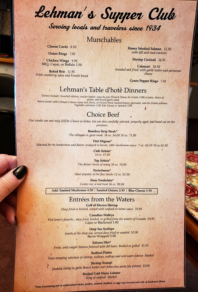 A menu that reads like a love letter to carnivores. Notice how they proudly declare their steaks are "hand cut on the premises"&mdash;music to a meat lover's ears.