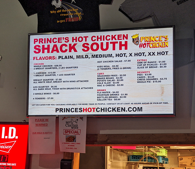 The menu board – part roadmap to paradise, part dare. Notice how "PLEASE BE WARNED" appears below, like the culinary equivalent of "abandon hope all ye who enter."