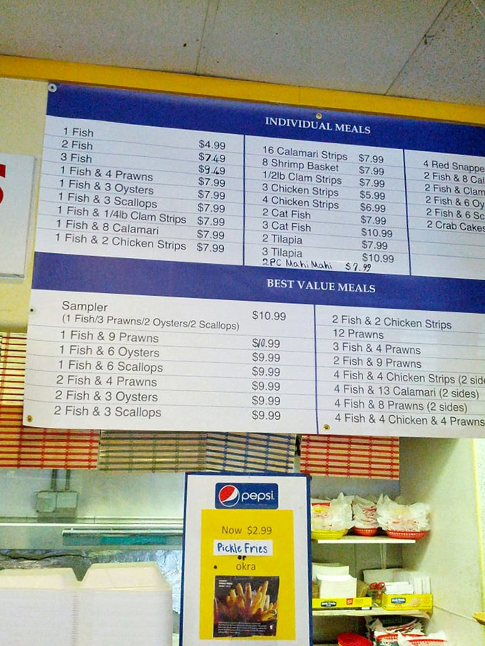 The menu board reads like poetry to seafood lovers. Notice how they don't waste precious space on vegetables? That's commitment.