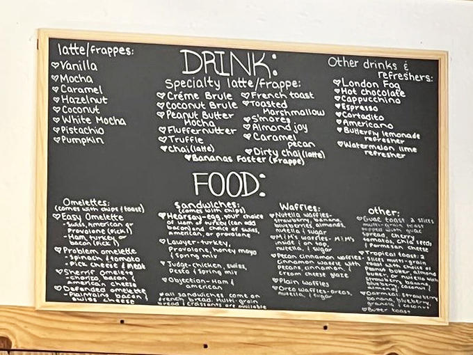 A chalkboard menu that causes the delicious agony of indecision. Each handwritten item is a potential pathway to breakfast bliss.
