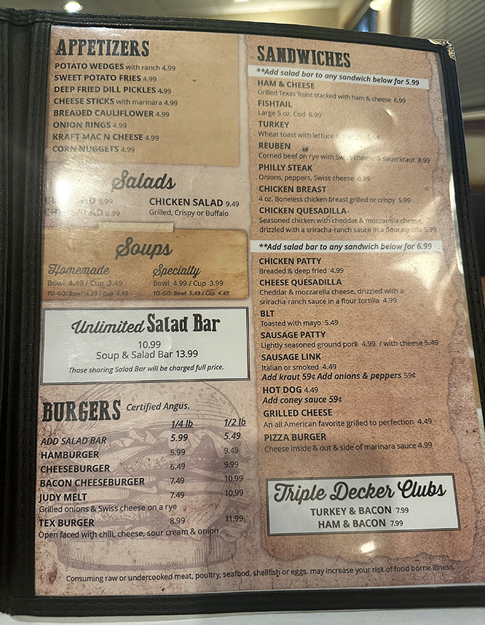 The menu reads like a love letter to American classics. That unlimited salad bar option is the siren call no local can resist.