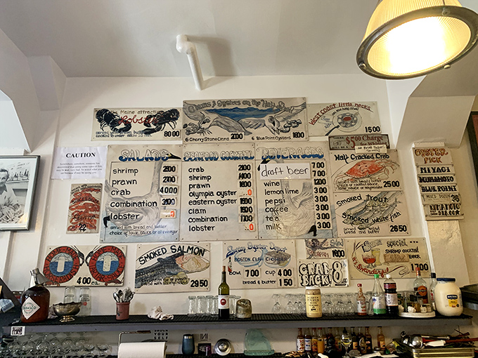 The handwritten menu board &ndash; a culinary treasure map where X marks the spot for oceanic delights. No fancy fonts needed when the food speaks this loudly.