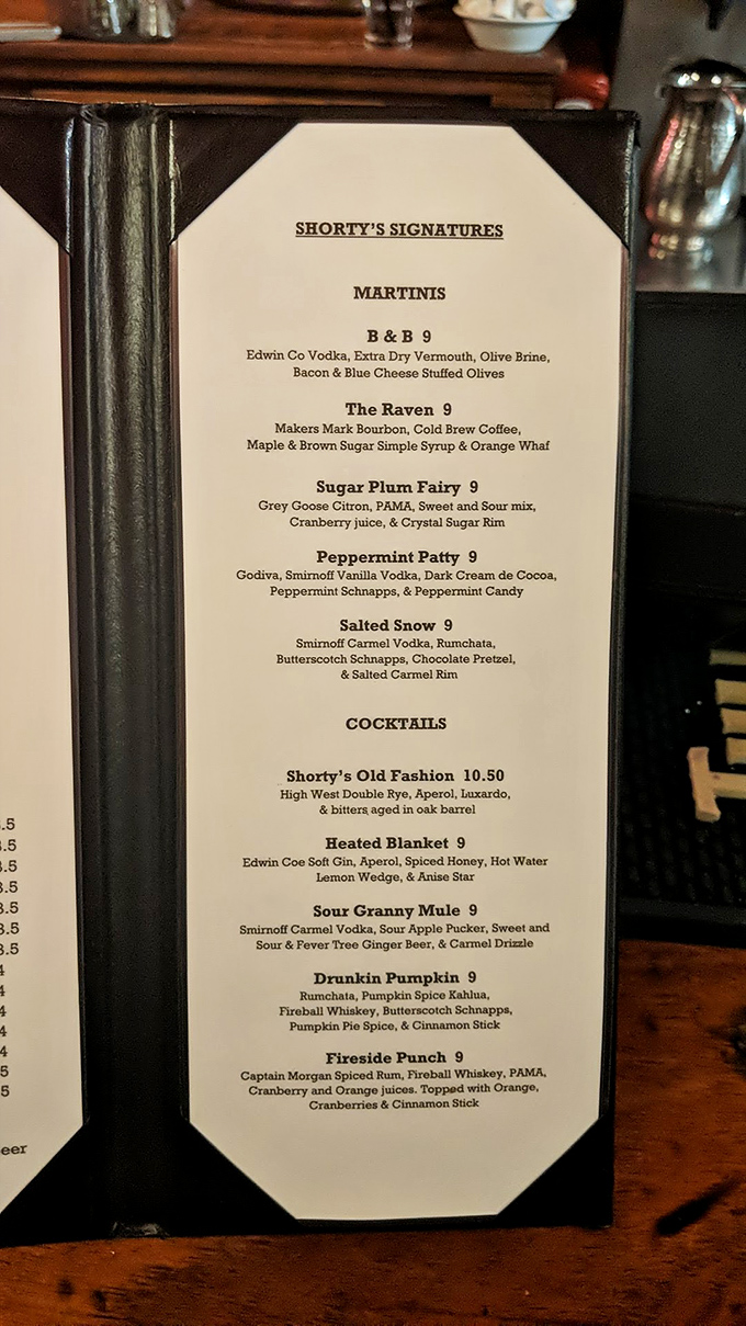 The cocktail menu reads like a love letter to creative mixology. That R&B 9 with bacon-stuffed olives? Pure genius.