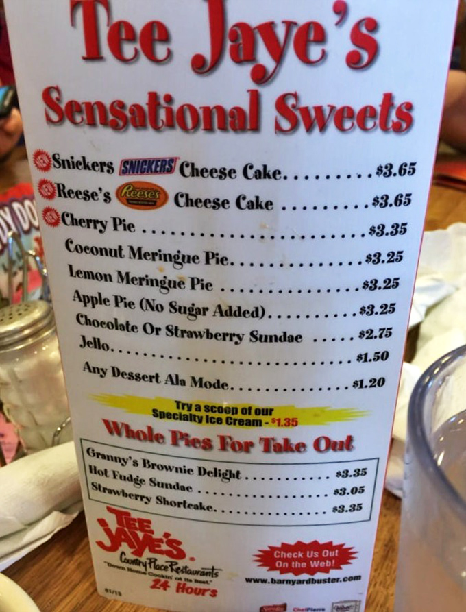 The dessert menu that launched a thousand diet cheat days. Those Snickers Cheesecake prices make me wonder if we've time-traveled back to 1995.