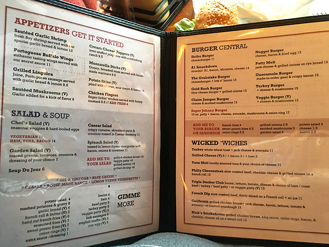 The menu reads like a love letter to comfort food, with one side dedicated to American classics and the other showcasing Portuguese specialties.