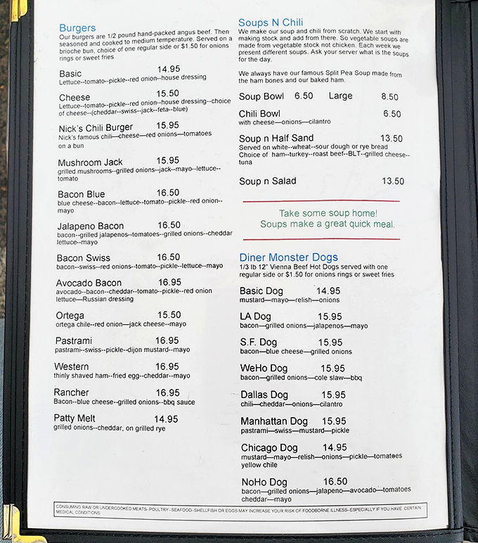 When a menu proudly features "Diner Monster Dogs" and split pea soup made from ham bones, you know you're in a place that understands comfort food fundamentals.