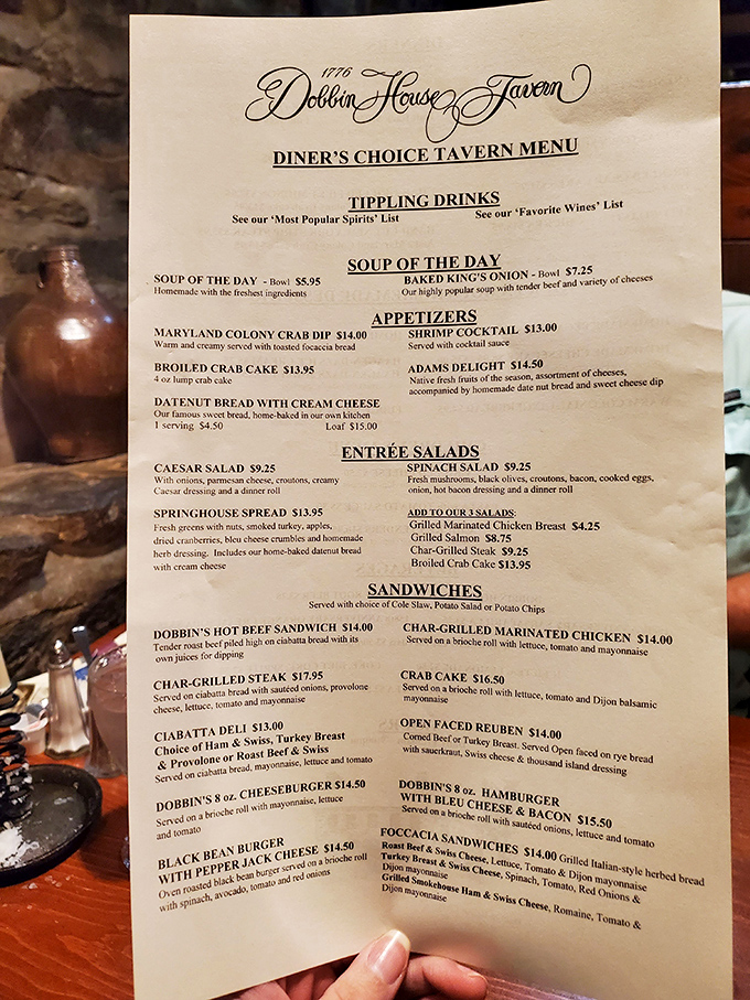 A menu that tells stories of American culinary tradition. Each dish name—from Maryland Colony Crab Dip to Springhouse Spread—feels like a delicious history lesson.