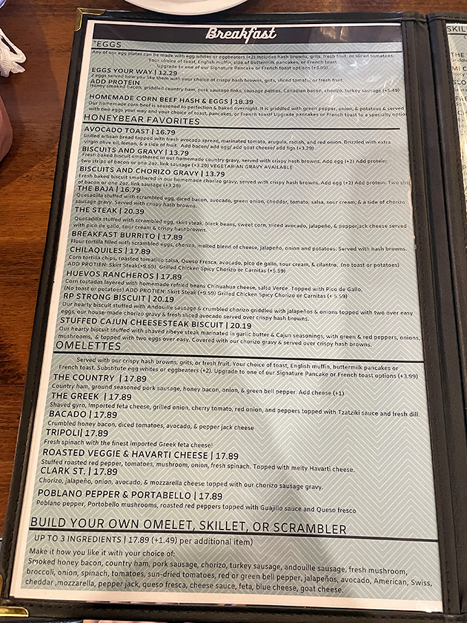 The menu reads like a love letter to breakfast enthusiasts&mdash;each description a promise that whatever morning blues you have will soon be smothered in something delicious.