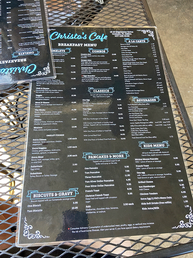 This menu is like a roadmap to breakfast nirvana. Notice the "Pancakes & More" section? That "& More" is doing some seriously heavy lifting here.