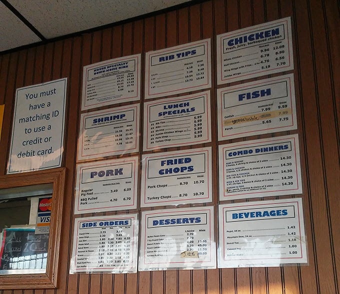 A menu board that tells you everything you need to know about life's priorities. Notice how "SHRIMP" gets its own special section!