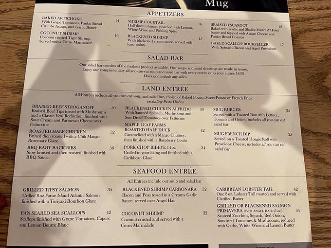 This menu reads like a love letter to comfort food, featuring prime rib alongside tempting seafood selections.