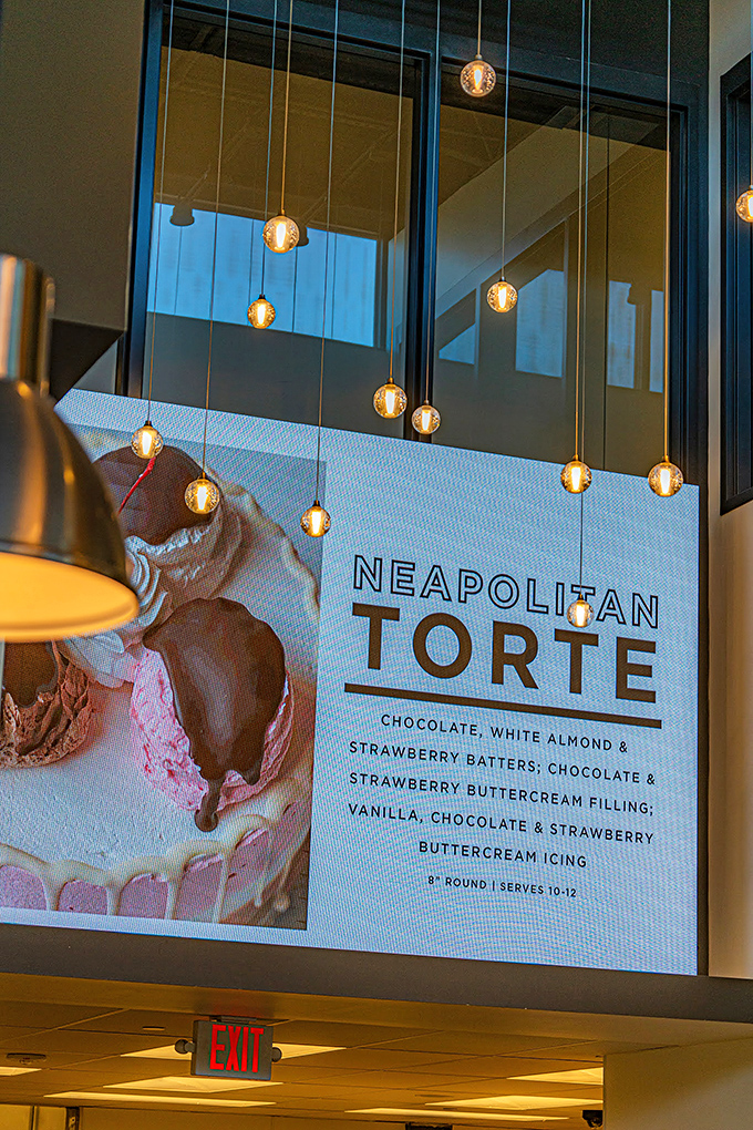 The Neapolitan Torte doesn't just have a description—it has a manifesto. Three flavors living in harmony like the dessert equivalent of world peace.