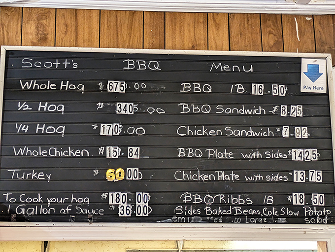 The chalkboard menu speaks volumes&mdash;whole hog to ribs, no fancy fonts required. In BBQ country, simplicity isn't just a virtue, it's a guarantee.