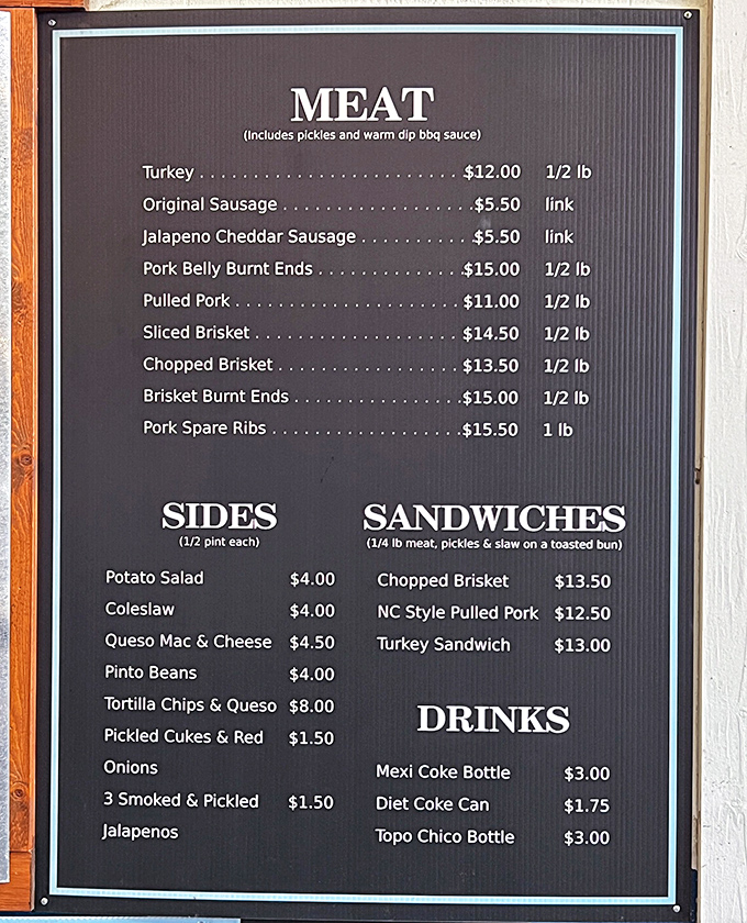 A menu board of dreams. Each line represents hours of smoking expertise, with no fancy descriptions needed – the meat speaks eloquently enough.