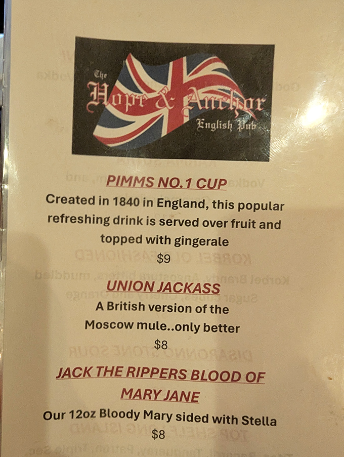 When a drink menu includes "Union Jackass" and "Jack the Ripper's Blood," you know you're in for British humor as dry as their gin.