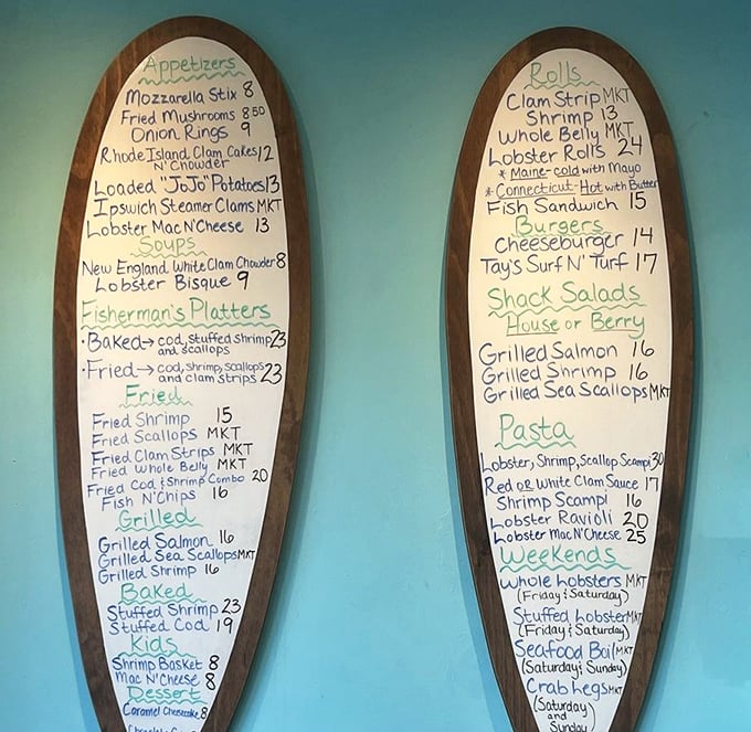 Menu boards shaped like giant wooden spoons—because regular menus just can't contain this level of seafood excitement. Reading it feels like treasure hunting without the wet feet.