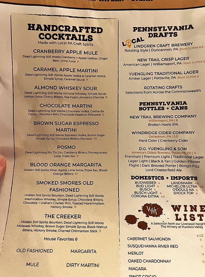 The drink menu reads like a love letter to Pennsylvania's craft spirits scene, with cocktails that could make even a teetotaler contemplate the merits of a Smoked S'mores Old Fashioned.