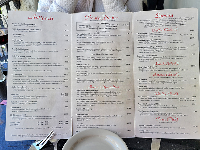 A menu that reads like a love letter to Italian cuisine. Each dish promises the kind of comfort that makes you want to kiss your fingertips like a cartoon chef.