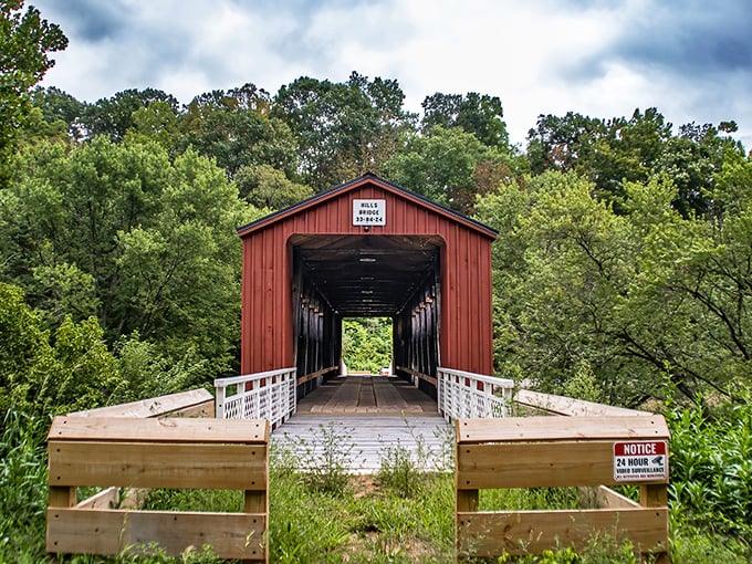 Standing at the threshold of history, this vibrant red entryway invites you to step back in time while the surrounding forest stands guard.