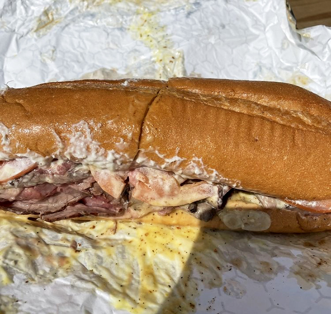 Behold the pit beef sub in all its glory &ndash; layers of smoky perfection that'll make your taste buds sing.