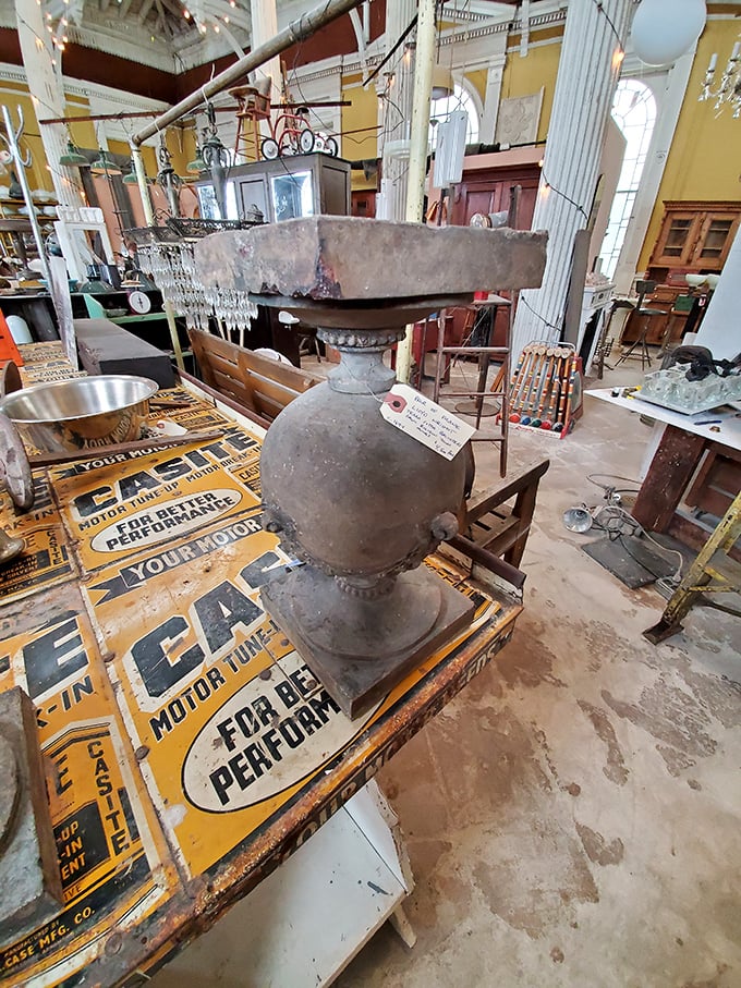 This isn't just any stone pedestal—it's a conversation piece with more character and history than most modern homes combined.