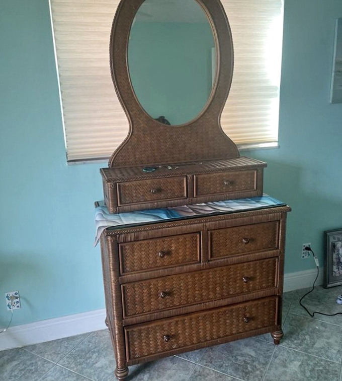 This woven rattan dresser whispers tales of tropical elegance. At retail prices, this beauty would cost more than a weekend in the Keys.