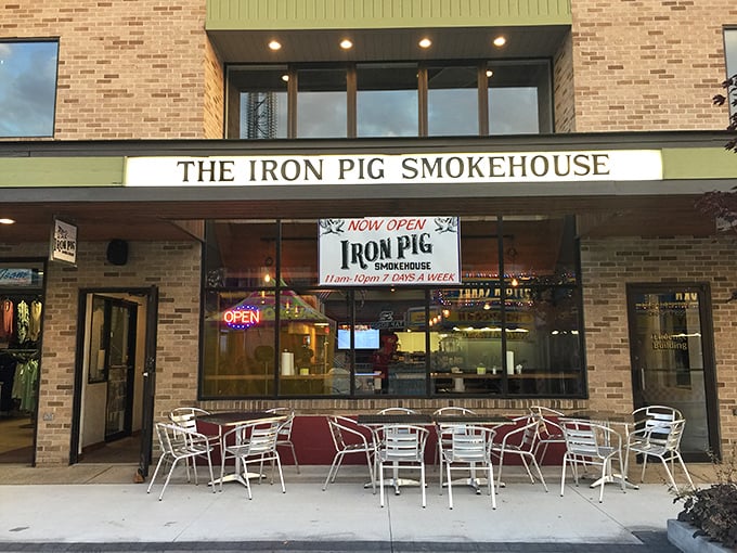 The Iron Pig Smokehouse beckons with promises of slow-cooked perfection &ndash; where outdoor seating lets you enjoy your BBQ with a side of people-watching.