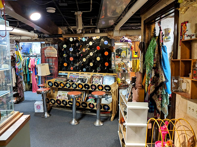 Vinyl records create a musical backdrop for this nostalgic nook. The wall of albums isn't decoration&mdash;it's a DJ booth for your memories.