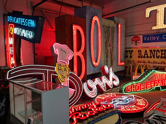 The neon graveyard glows with the ghosts of restaurants past. That "BOL" sign probably witnessed more first dates than a high school guidance counselor.